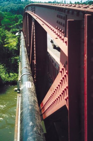 Bridge crossing pipe laying | Pamline